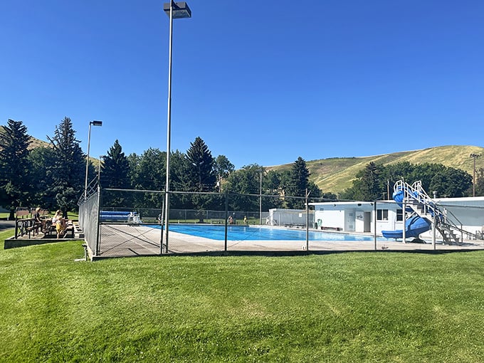 Summer salvation comes chlorinated at Pomeroy's public pool. Against the backdrop of golden hills, it's the town's social hub when temperatures climb.