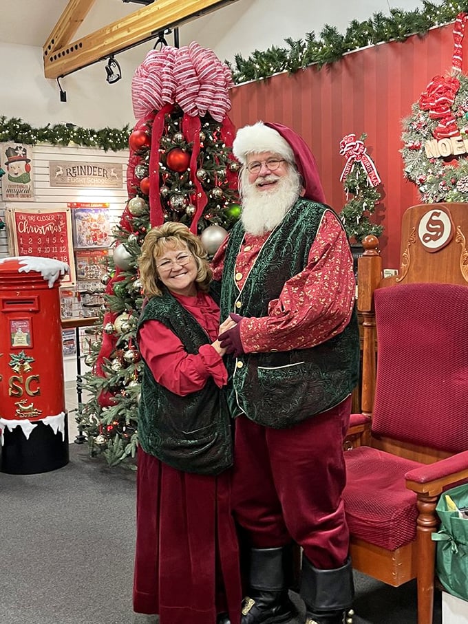 The holiday spirit personified! Santa and Mrs. Claus await visitors in their North Pole headquarters, ready for photos and wish lists.