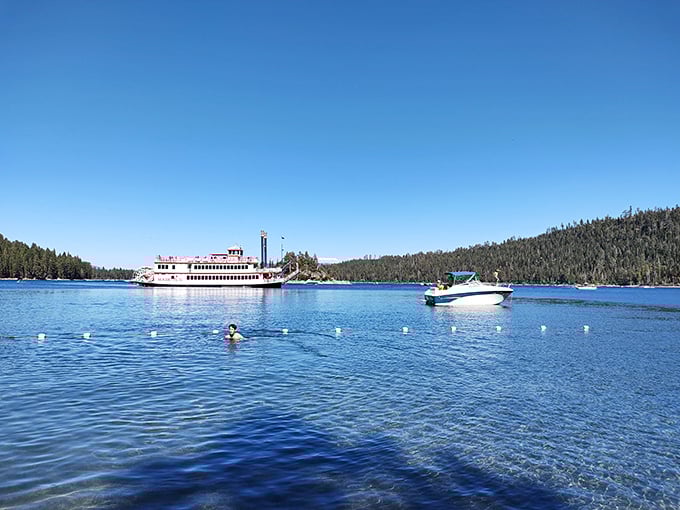 The paddle wheeler gliding across Emerald Bay like it wandered out of a Mark Twain novel and decided to stay.