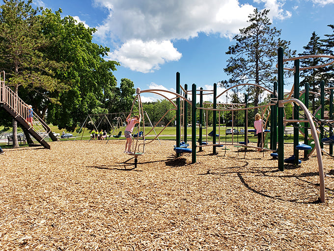 Childhood memories in the making at Walker City Park, where the laughter of kids echoes across generations of Minnesota summers.