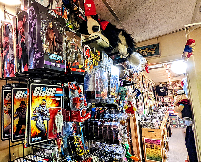 Action figure heaven! G.I. Joe stands at attention while Guardians of the Galaxy keep watch over a collection that would make any collector weep with joy.