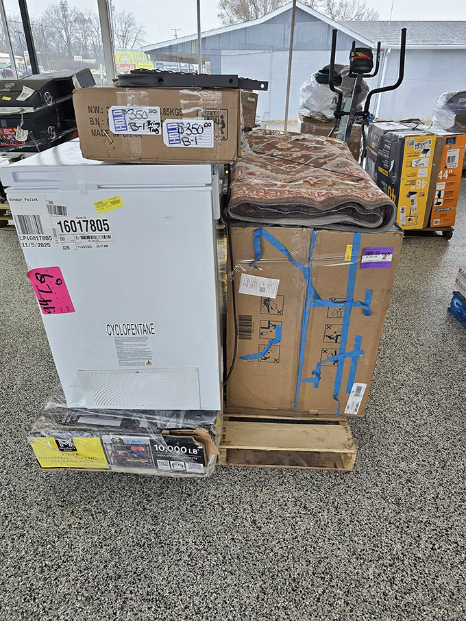 Pallets of possibility! That refrigerator might cost hundreds elsewhere, but here it's just waiting for someone with vision&mdash;and trunk space.