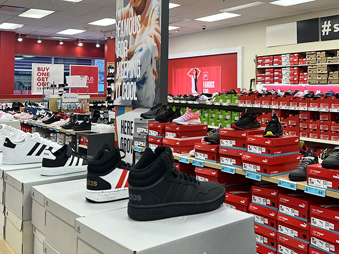 Sneaker heaven awaits with rows of discounted footwear—where "just dropped" refers to both new arrivals and dramatically slashed prices.