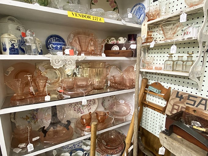 Depression glass paradise where your grandmother's pink dishes find new friends. Each shelf tells stories of Sunday dinners from decades past.
