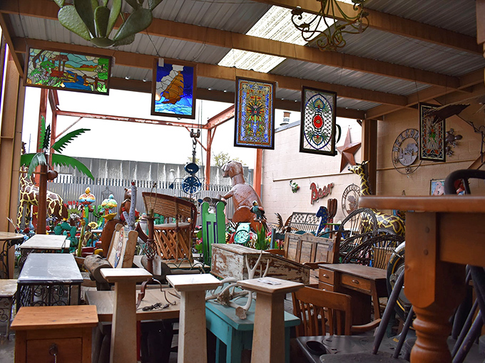 Stained glass catches the light like jewels in a crown, while mismatched furniture creates the world's most inviting waiting room for time travelers.