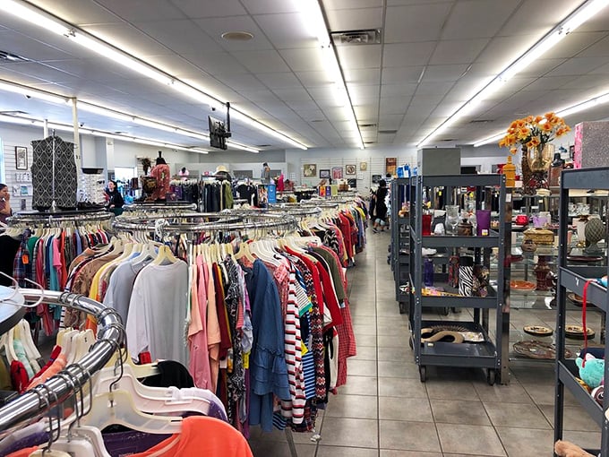 Rows of clothing stretch endlessly, proving that one person's closet purge is another person's wardrobe jackpot.