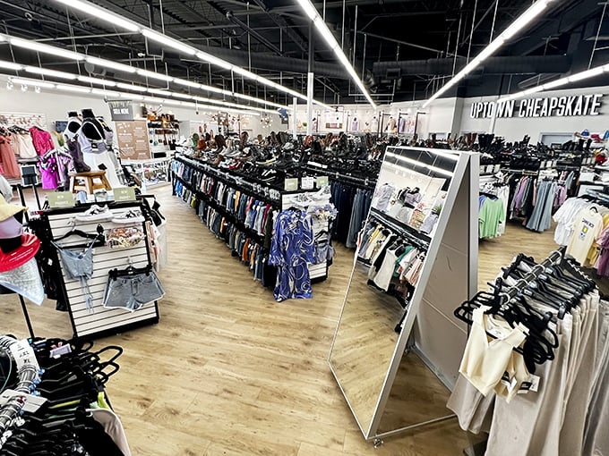 Fashion democracy in action &ndash; meticulously organized racks create pathways to style salvation, with full-length mirrors ready to confirm your bargain victory dance.