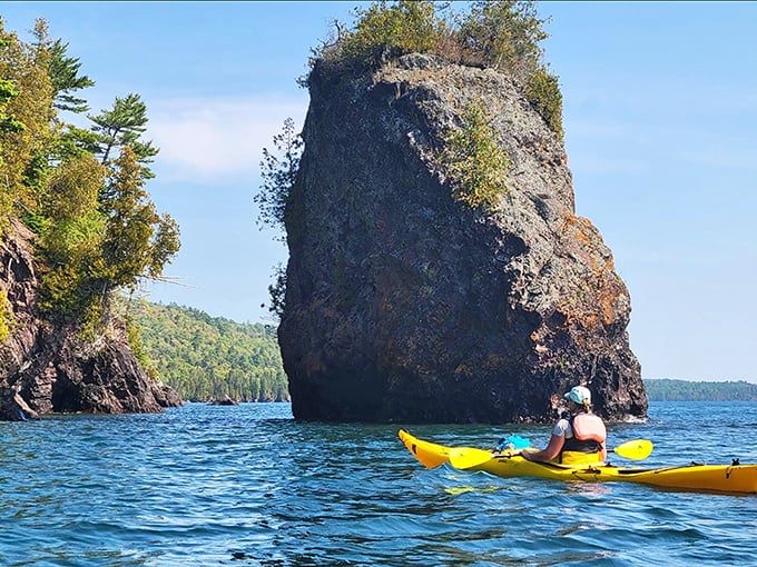 Nature carved this dramatic sea stack just for kayakers brave enough to paddle Lake Superior's crystal waters.