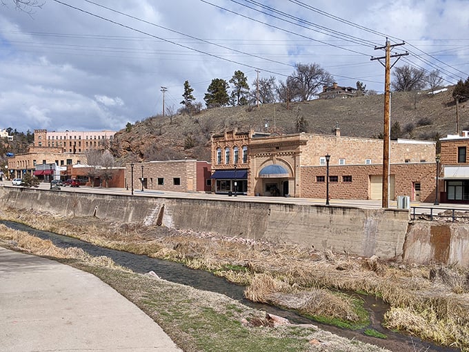 Downtown Hot Springs showcases its signature sandstone architecture along Fall River, where history flows as steadily as the water below.