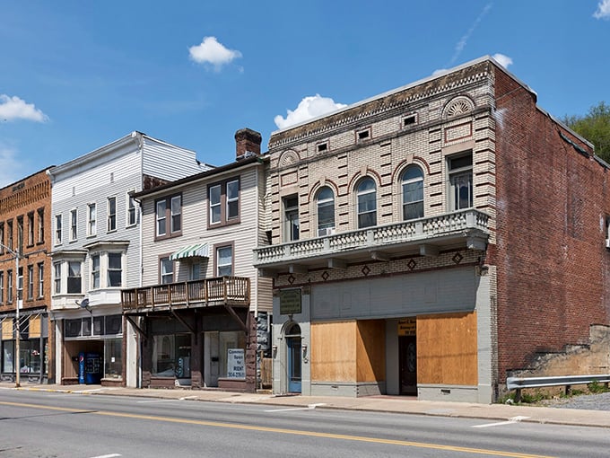 Main Street's mix of historic buildings tells stories of bygone eras, where every faded ghost sign represents a chapter in Grafton's economic history.