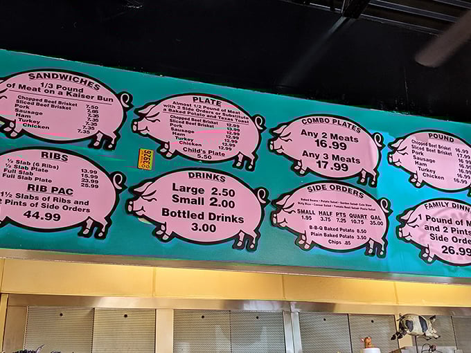 The menu board's pink pig silhouettes tell you everything you need to know&mdash;this place prioritizes meat over marketing, substance over style.