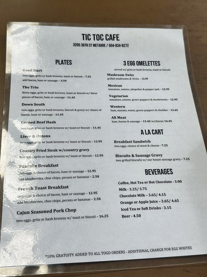 The laminated menu&mdash;a love letter to traditional breakfast with Louisiana flair. When a menu is this straightforward, you know you're in for honest-to-goodness cooking.