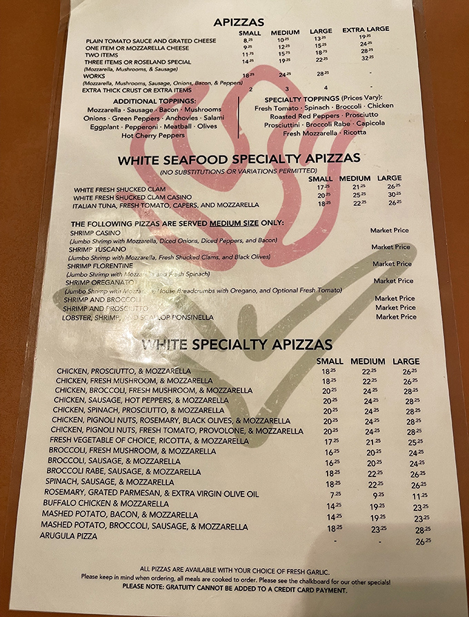 The menu reads like a love letter to Italian-American cuisine. Each specialty pizza promises a different path to culinary bliss.