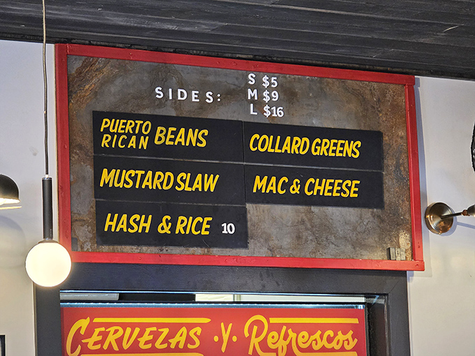 The menu board tells the delicious truth: this isn't just any BBQ joint. Puerto Rican beans alongside collards? That's cultural harmony on a plate.