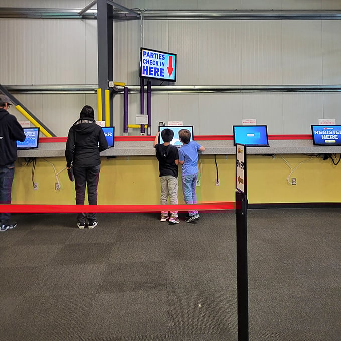 The gateway to birthday glory, where kids stand on tiptoes with anticipation and parents mentally calculate how many arcade tokens equals one college credit.