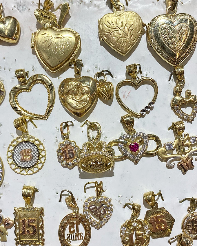 Vintage heart lockets await new owners to fill them with memories. Someone's grandmother once treasured these golden keepsakes.