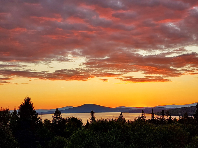 Sunset alchemy transforms Rangeley Lake into liquid gold. Worth staying up past dinner for this dessert course of colors.