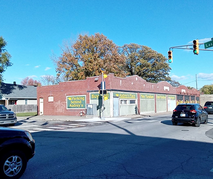 The unassuming brick exterior of Audrey's Place hides a treasure trove of budget-friendly furniture finds waiting to be discovered.