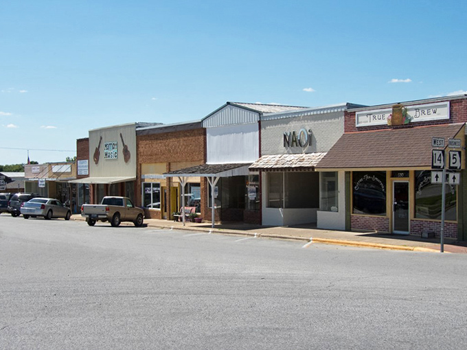 Ava's downtown vista showcases charming brick buildings beneath endless blue skies – postcard-perfect without the tourist prices.