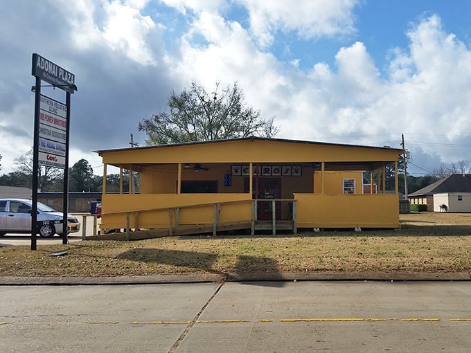 Caro's sunny yellow exterior is like a cheerful abuela waving you in for some home cooking. Blink and you might miss it!