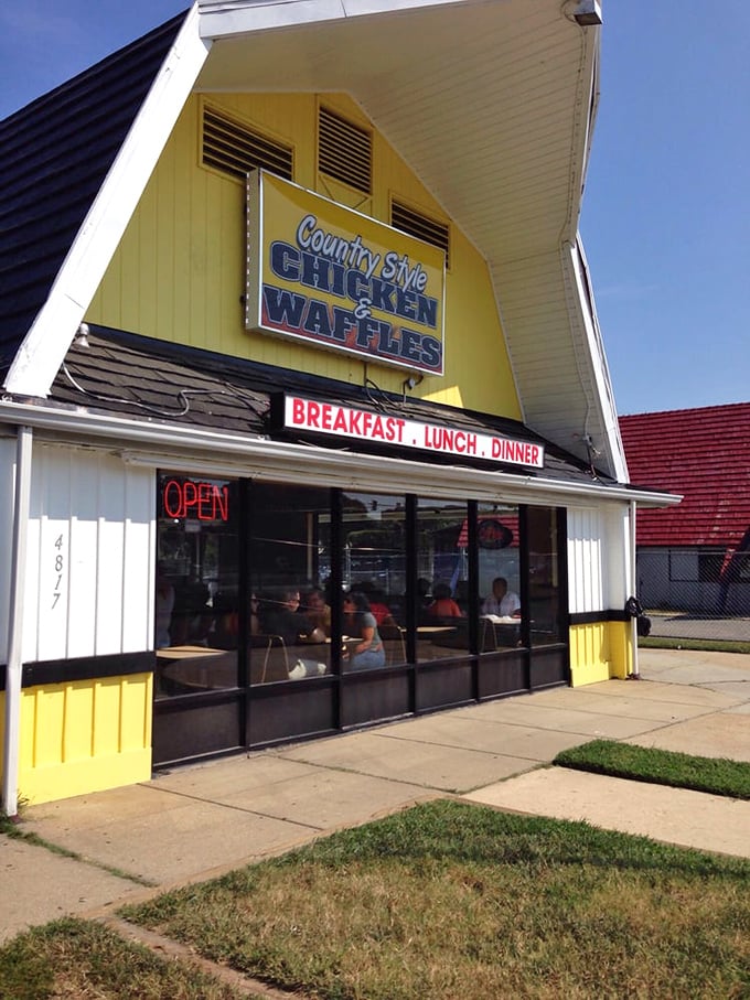 That yellow barn-style building whispers "country cooking" louder than any fancy restaurant sign ever could.