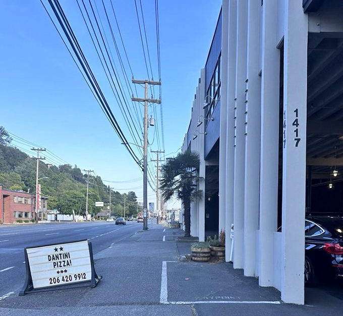 Dantini Pizza's unassuming exterior plays it cool, like that friend who casually mentions they used to be in a band with Tom Petty.