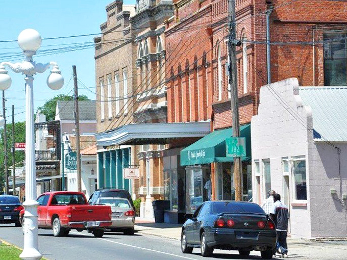 Historic brick buildings line Franklin's Main Street, where ornate architecture and charming storefronts create a timeless small-town atmosphere.