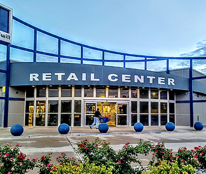 Those blue spheres out front aren't just decoration - they're like breadcrumbs leading to bargain paradise.