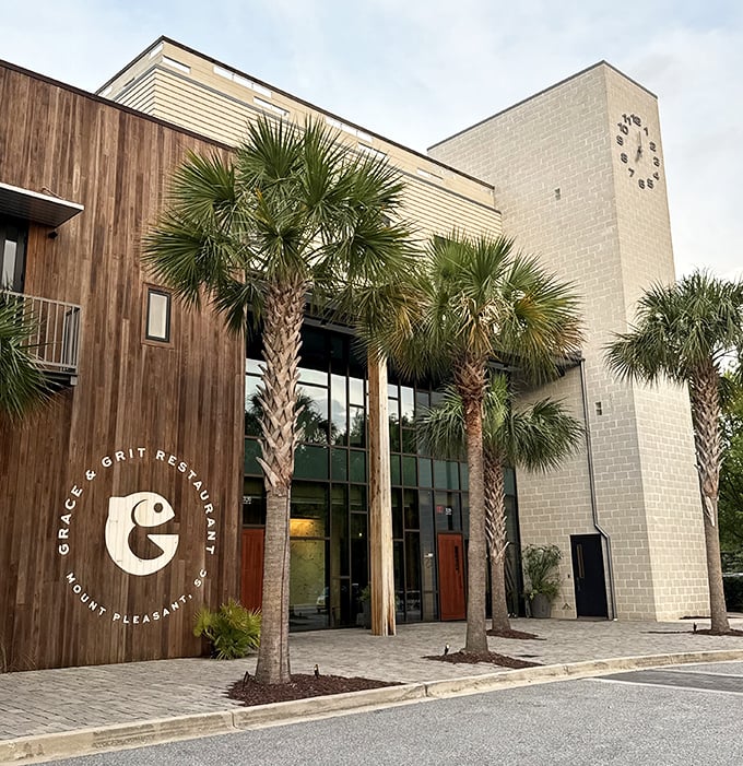 Grace & Grit's modern design blends wood and stone with palm trees, creating a sophisticated setting for their elevated Southern classics.