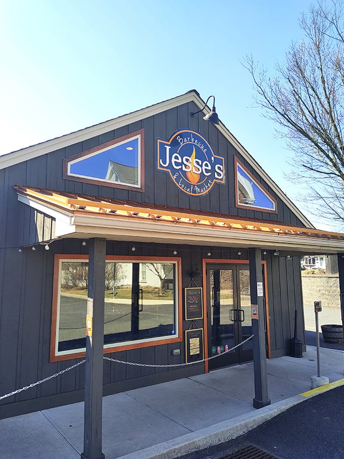 Jesse's navy blue exterior might look unassuming, but that sign promises a barbecue experience that's anything but ordinary.