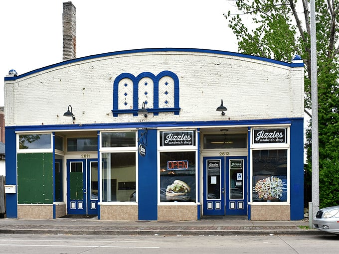 Jizzles' distinctive blue facade stands out like a sandwich beacon. This neighborhood gem has "local favorite" written all over it.
