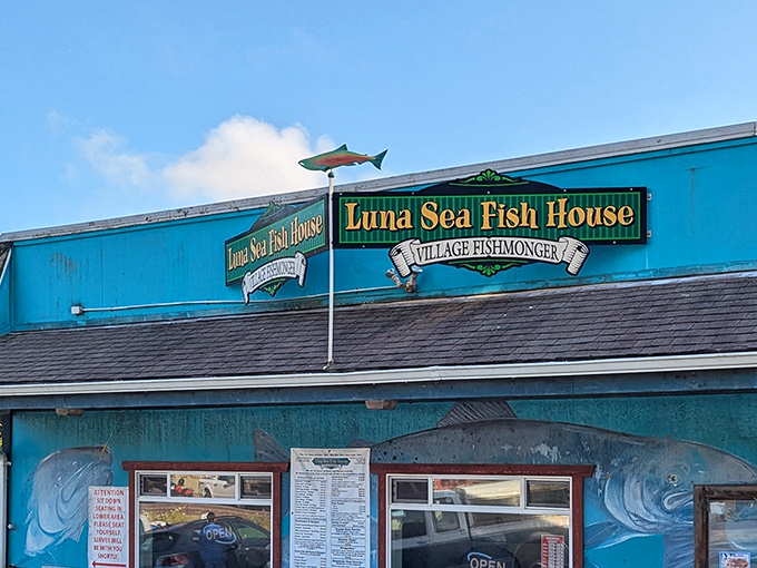 Luna Sea's turquoise building and fish weathervane stand as beacons for seafood lovers navigating Highway 101's culinary waters.