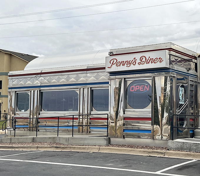 Penny's Diner brings classic American roadside dining to life with that unmistakable vintage silver car charm.