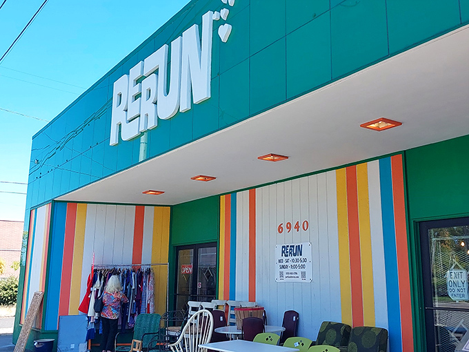 RERUN's turquoise facade and rainbow stripes promise a vintage wonderland inside. Like stepping into Wes Anderson's garage sale.
