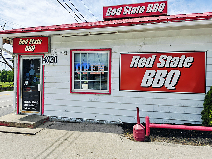 Red State BBQ's humble white building with bold red signage&mdash;like a shy friend who turns out to be the life of the party.