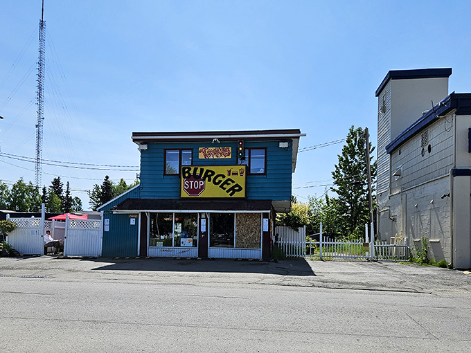 Tommy's teal facade might be humble, but that bold "BURGER" sign makes a promise it absolutely keeps.