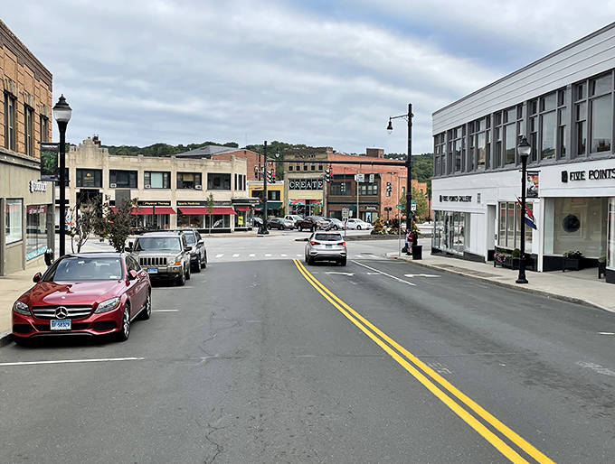 Torrington's stately homes stand like friendly sentinels, their white picket fences and yellow facades creating a neighborhood where Mr. Rogers would feel right at home.
