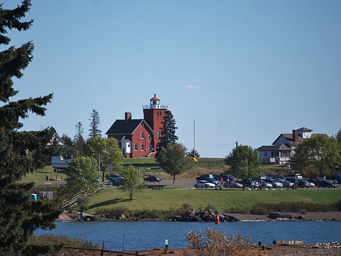 Two Harbors' iconic red lighthouse stands sentinel over Lake Superior, offering postcard views that cost nothing but are worth everything.