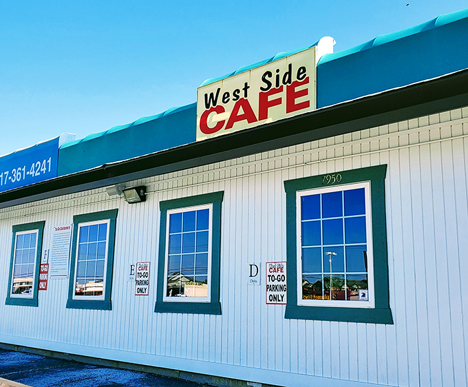 That turquoise trim isn't just decorative&mdash;it's a beacon calling hungry souls toward breakfast salvation at West Side Cafe.