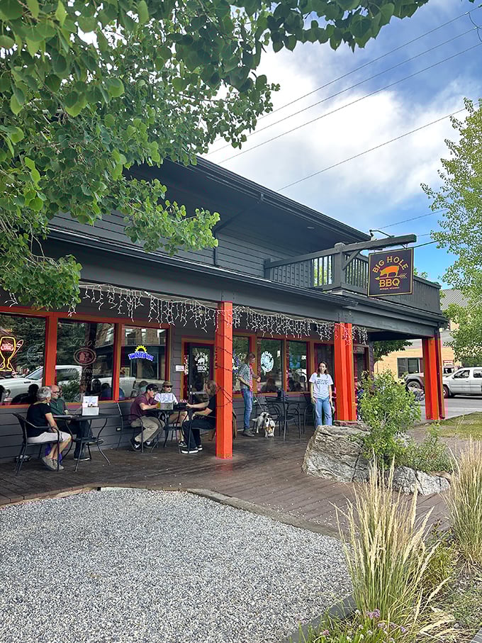 The perfect Wyoming summer scene: blue skies, outdoor seating, and BBQ worth writing home about at Big Hole.