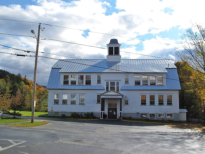 Chelsea's charming blue schoolhouse watches over the town like a guardian of simpler times and neighborly connections.