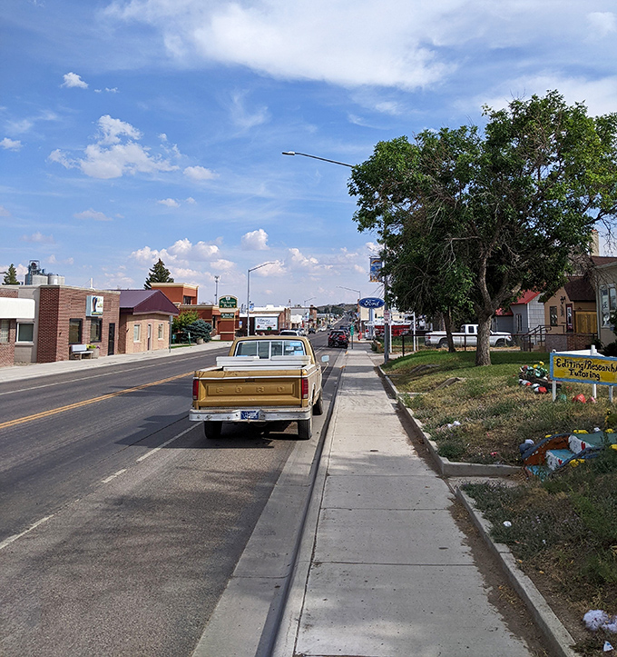 Cut Bank's main drag &ndash; where neon still glows, pickup trucks still rule, and housing costs won't cut into your fishing budget.