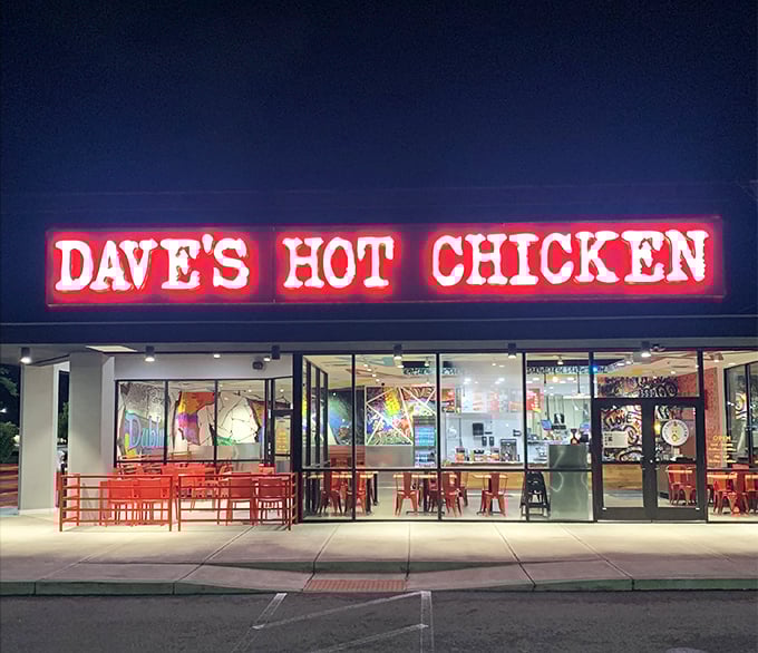 By night, Dave's neon sign glows like a beacon for spice-seekers. Your taste buds' most delicious warning sign.