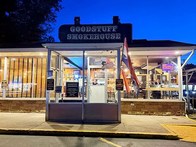 Goodstuff Smokehouse at night: The evening glow transforms this simple storefront into a nocturnal BBQ oasis, drawing in smoke-seekers like moths to flame.