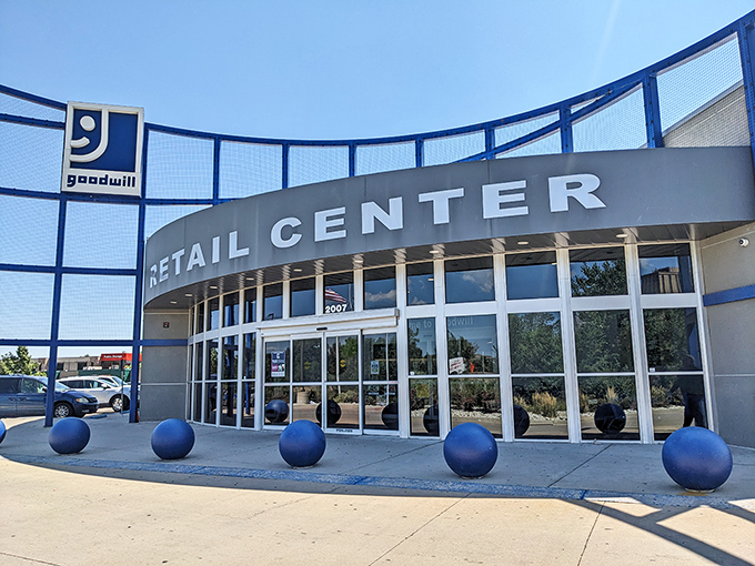 The curved glass facade promises retail therapy without the guilt of overspending your retirement fund.