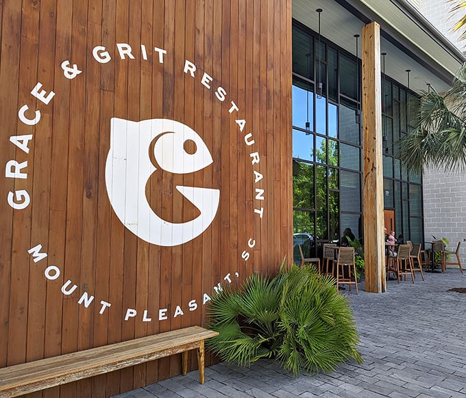 The sleek wooden exterior of Grace & Grit features their distinctive fish logo &ndash; a hint at the seafood treasures waiting inside.