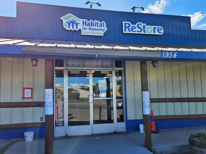 Blue skies and blue signage—a perfect match! Idaho Falls ReStore welcomes bargain hunters with its "Donate, Volunteer, Shop" mantra.