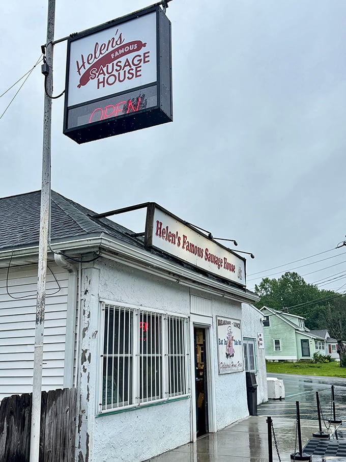 Rain or shine, Helen's neon "OPEN" sign glows like a beacon for sausage sandwich pilgrims seeking breakfast nirvana.