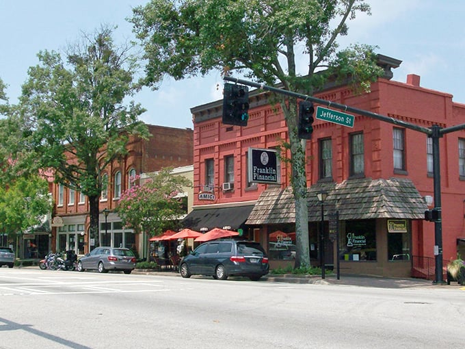 These tree-lined streets whisper tales of the Old South, where every mansion seems ready for its close-up.
