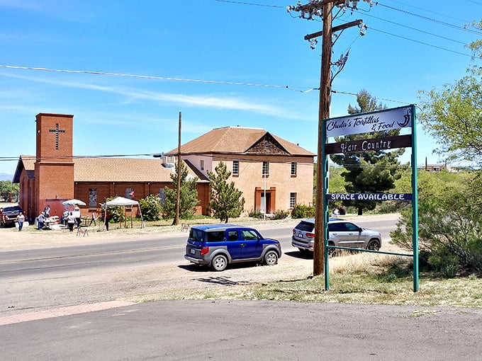 Oracle's community center stands ready for visitors. That church steeple has witnessed more desert sunsets than most of us have had hot dinners.